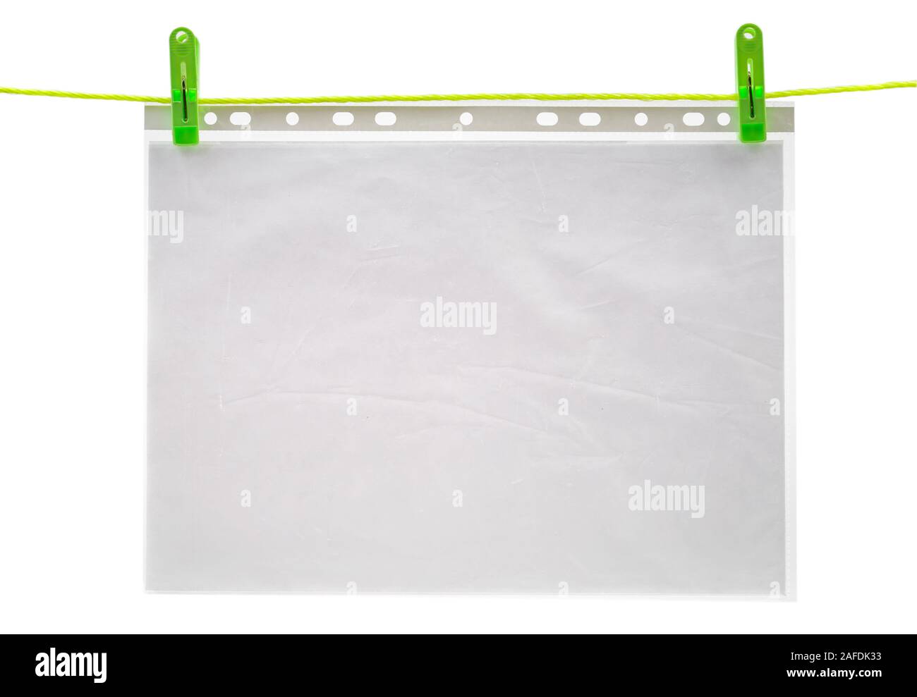 Blank advertising paper in plastic file hang on clothesline with ...