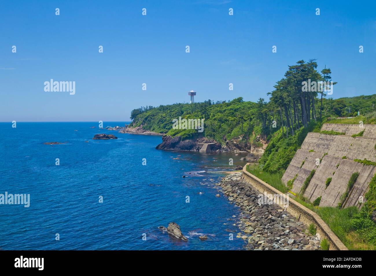 Scenery of Tojinbo cliff and tojinbo tower in Fukui prefecture, Japan ...