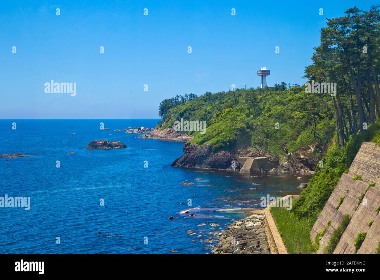 Scenery of Tojinbo cliff and tojinbo tower in Fukui prefecture, Japan ...