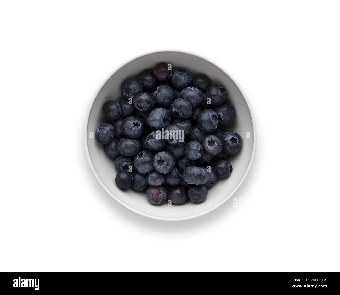 A white bowl full of delicious fresh Blueberries, isolated on a white ...