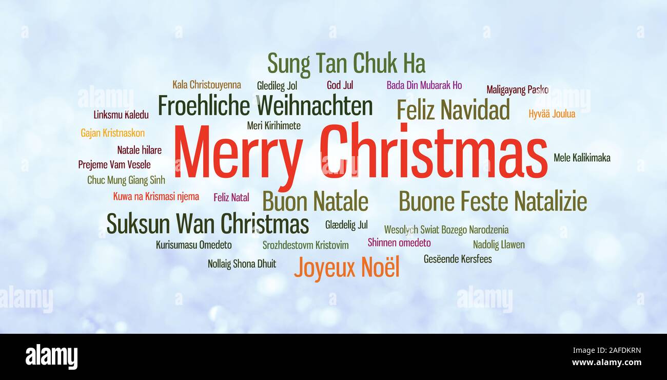 Merry Christmas various languages greetings on blurred blue snow ...