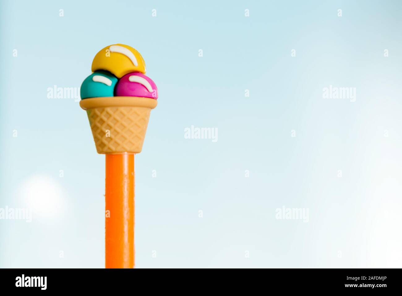 Gelati ice cream cone held up to the hot summer sky Stock Photo - Alamy
