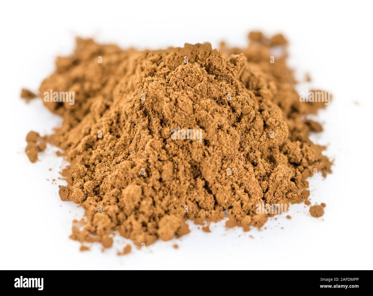 Portion of Cinnamon (as close-up shot) isolated on white background ...