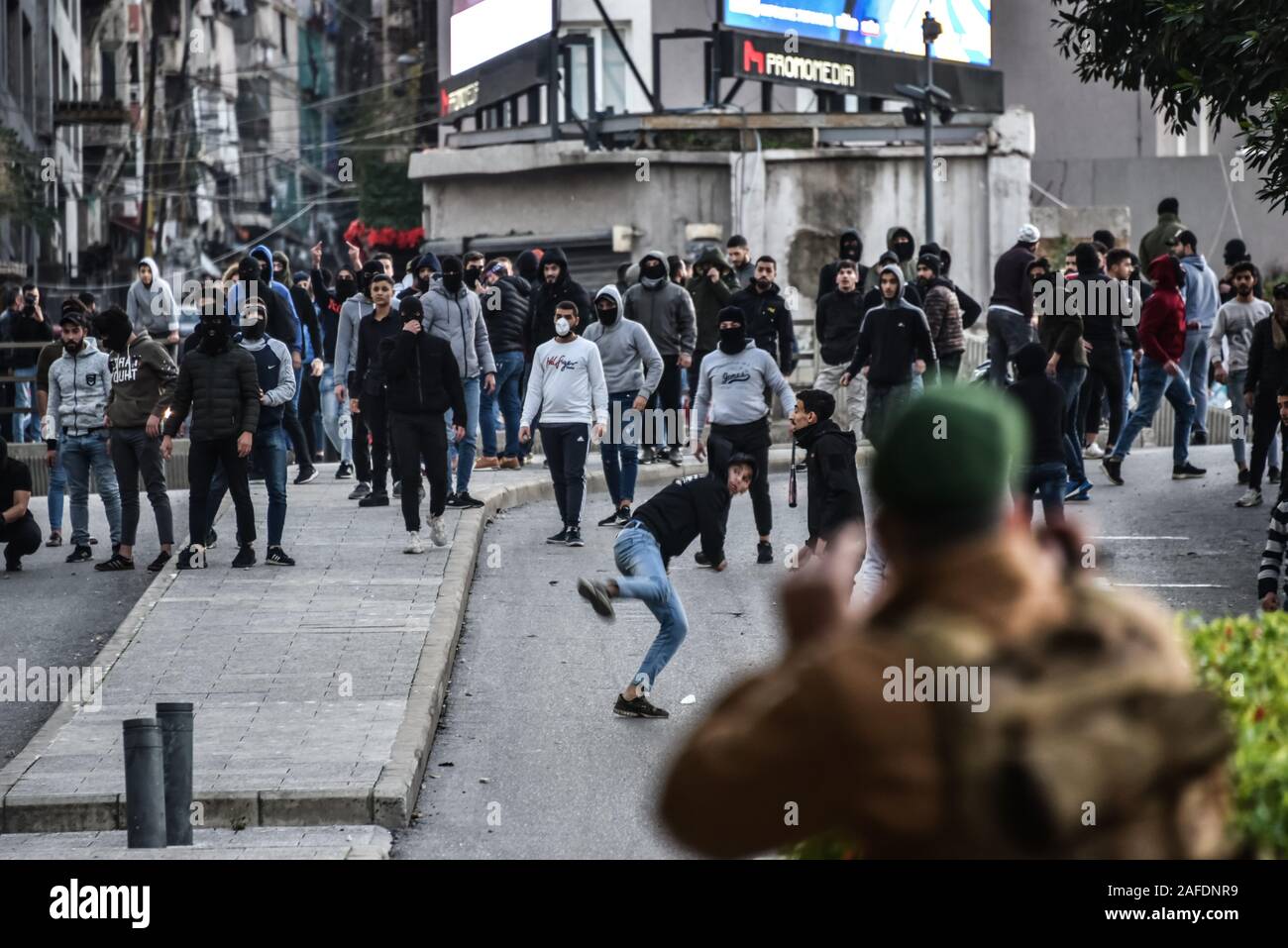 Beirut, Lebanon. 14th Dec, 2019. Army personel face off with people ...