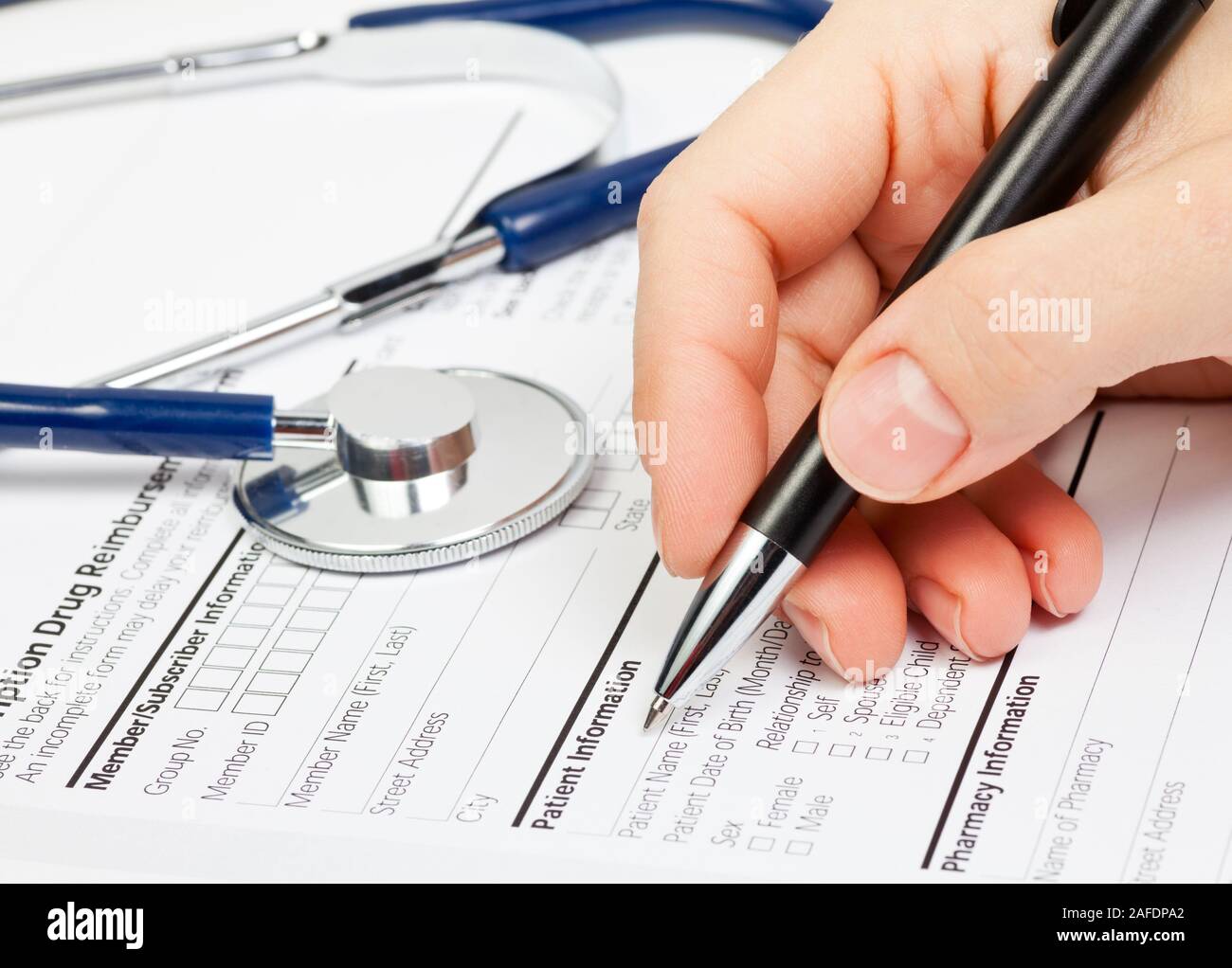 Doctor ready to fill patient information in Prescription form Stock ...