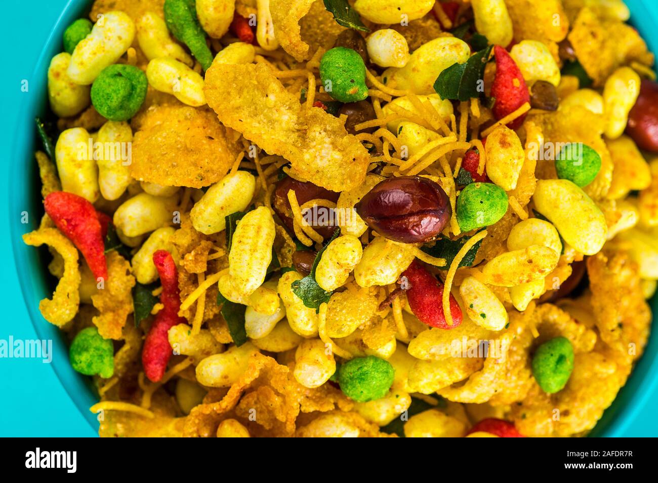 Indian Snacks: Traditional Indian deep fried salty dish called chivda ...