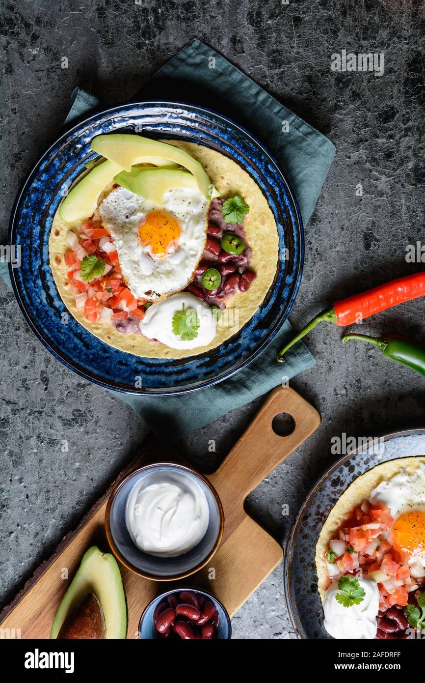 Delicious Huevos Rancheros Tostadas, Mexican breakfast consisting of ...
