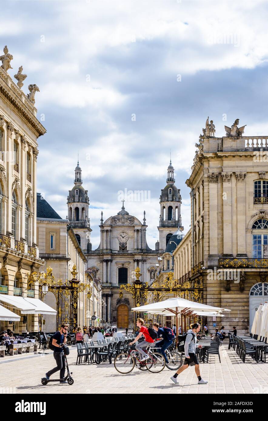 People strolling by the Grand Hotel on the Stanislas square in Nancy ...