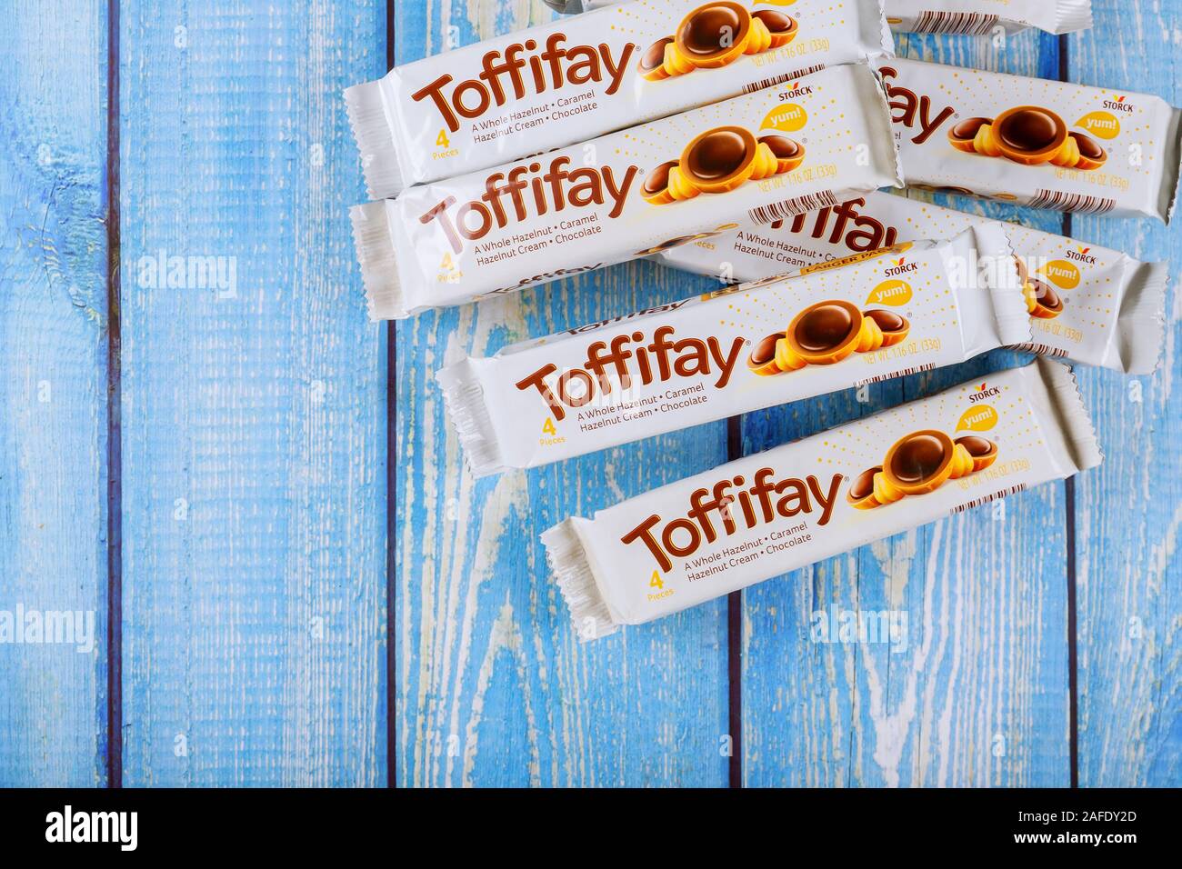 New York NY NOV 29 2019: Box of Toffifee caramel candy on old wooden ...
