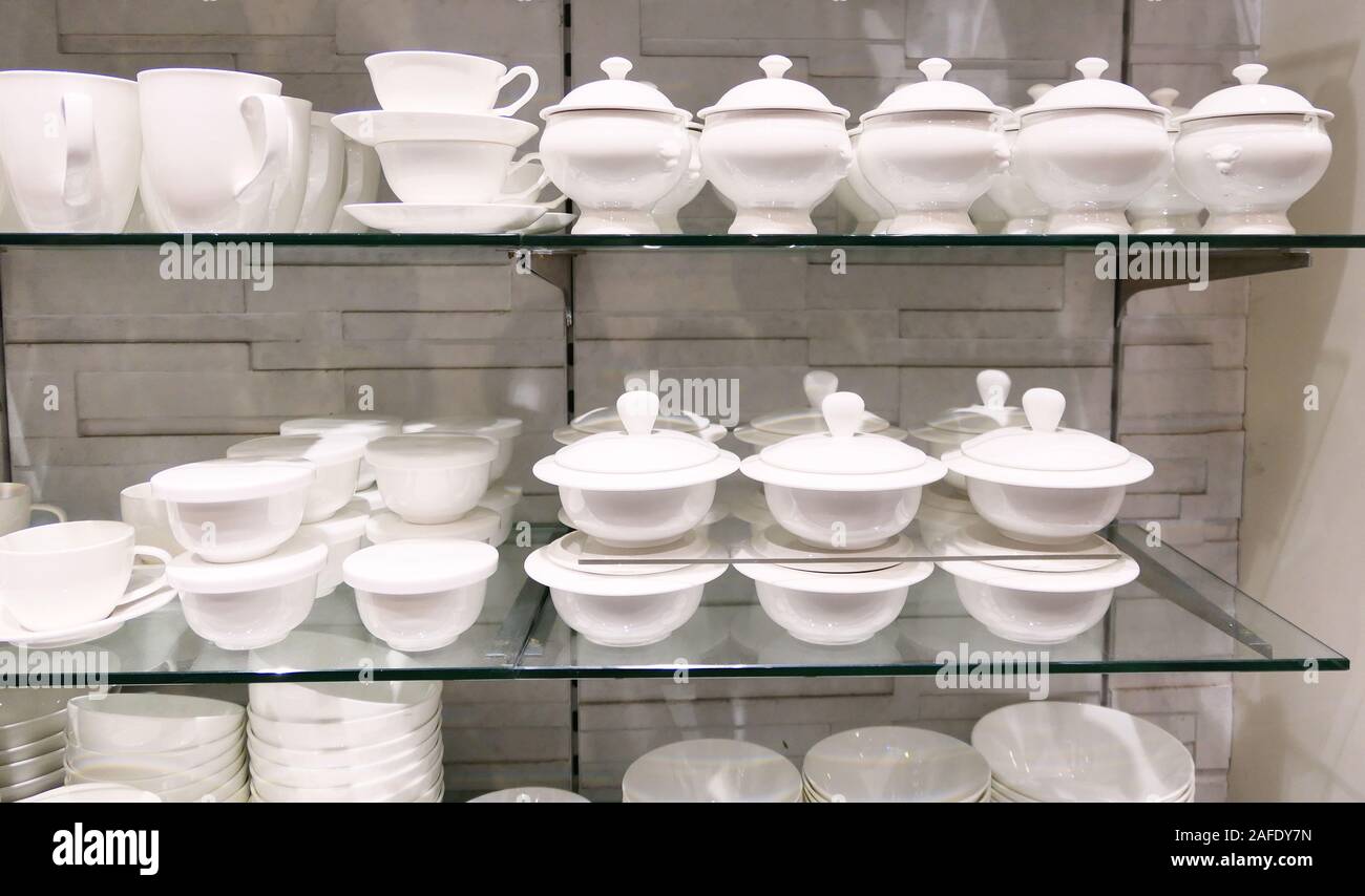 Cups in the crockery shop Stock Photo - Alamy