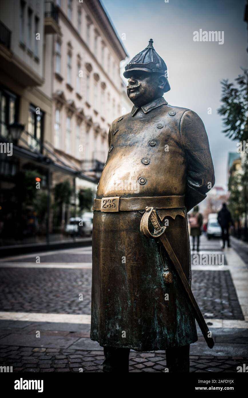 A bronze statue, The Fat Policeman on Zrinyi utca, Budapest. Rub his ...