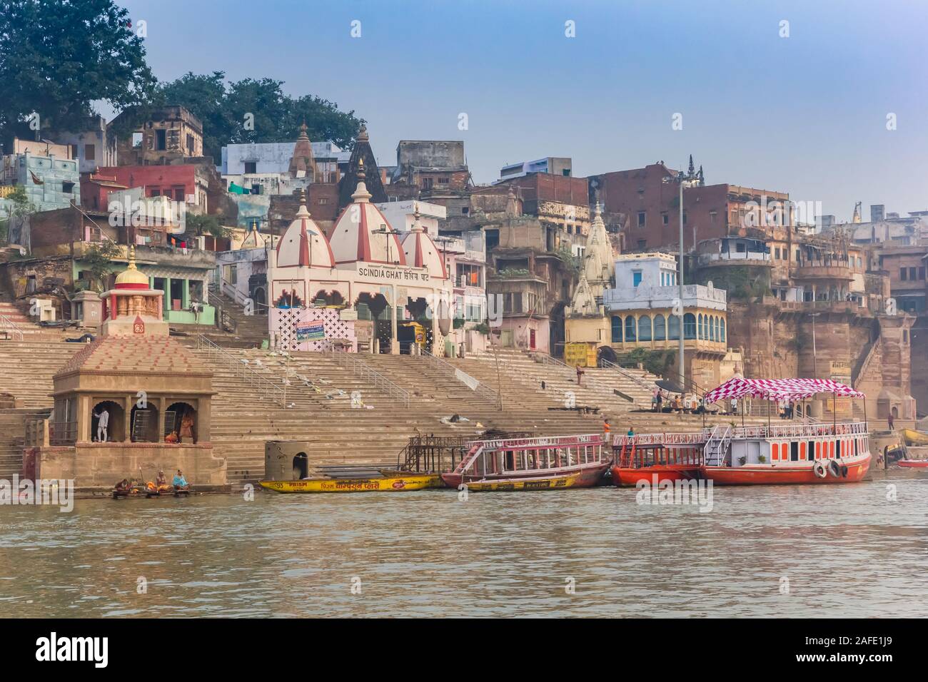 Temple and boats at the Scindia Ghat in Varanasi, India Stock Photo - Alamy