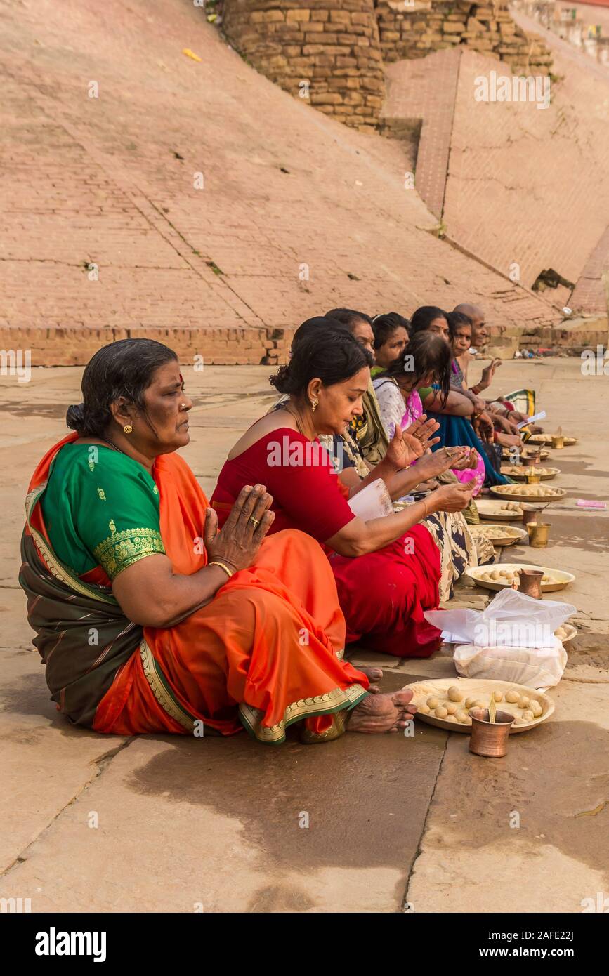 Women praying in water hi-res stock photography and images - Alamy