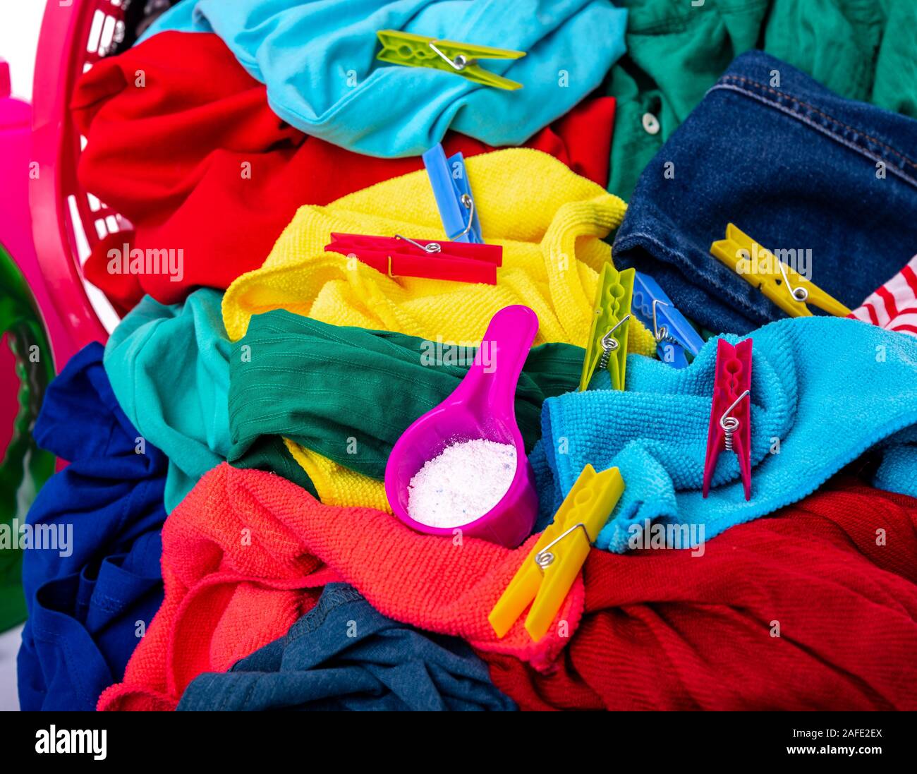 Multi-colored laundry for washing Stock Photo - Alamy