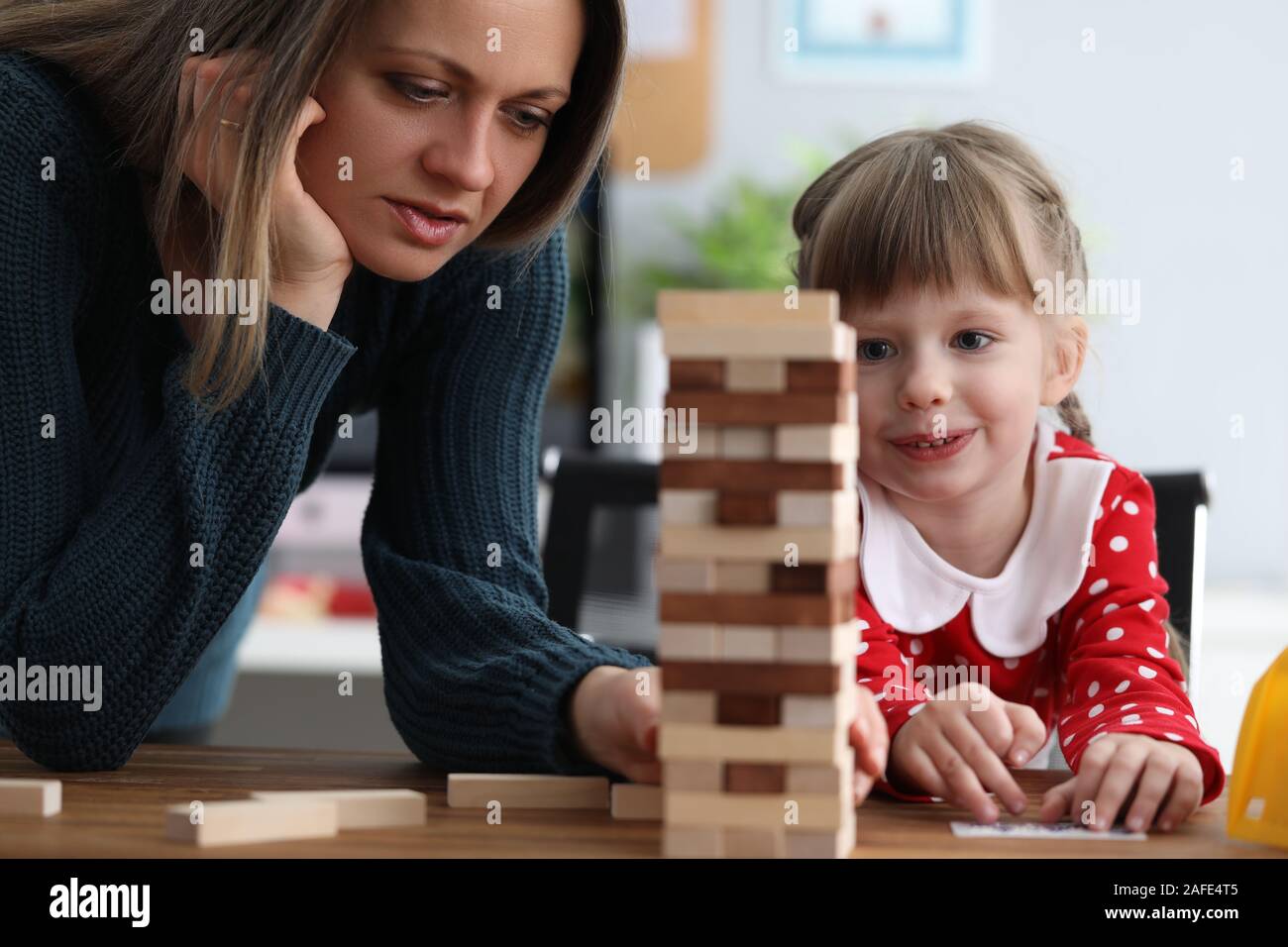 Girl spending time with mom Stock Photo - Alamy