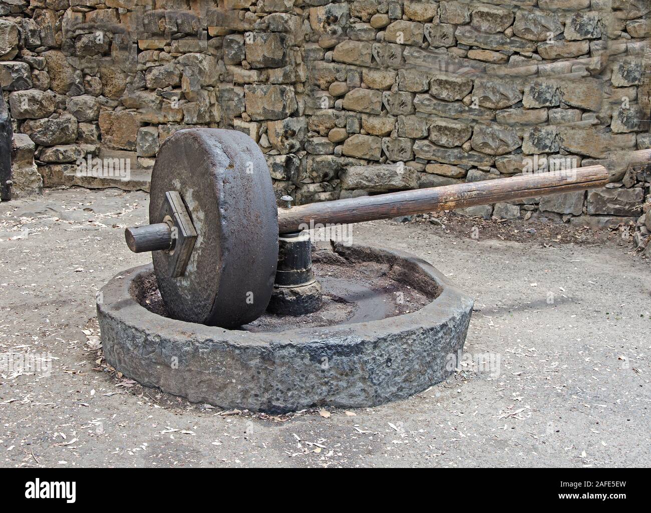 Griding stone hi-res stock photography and images - Alamy