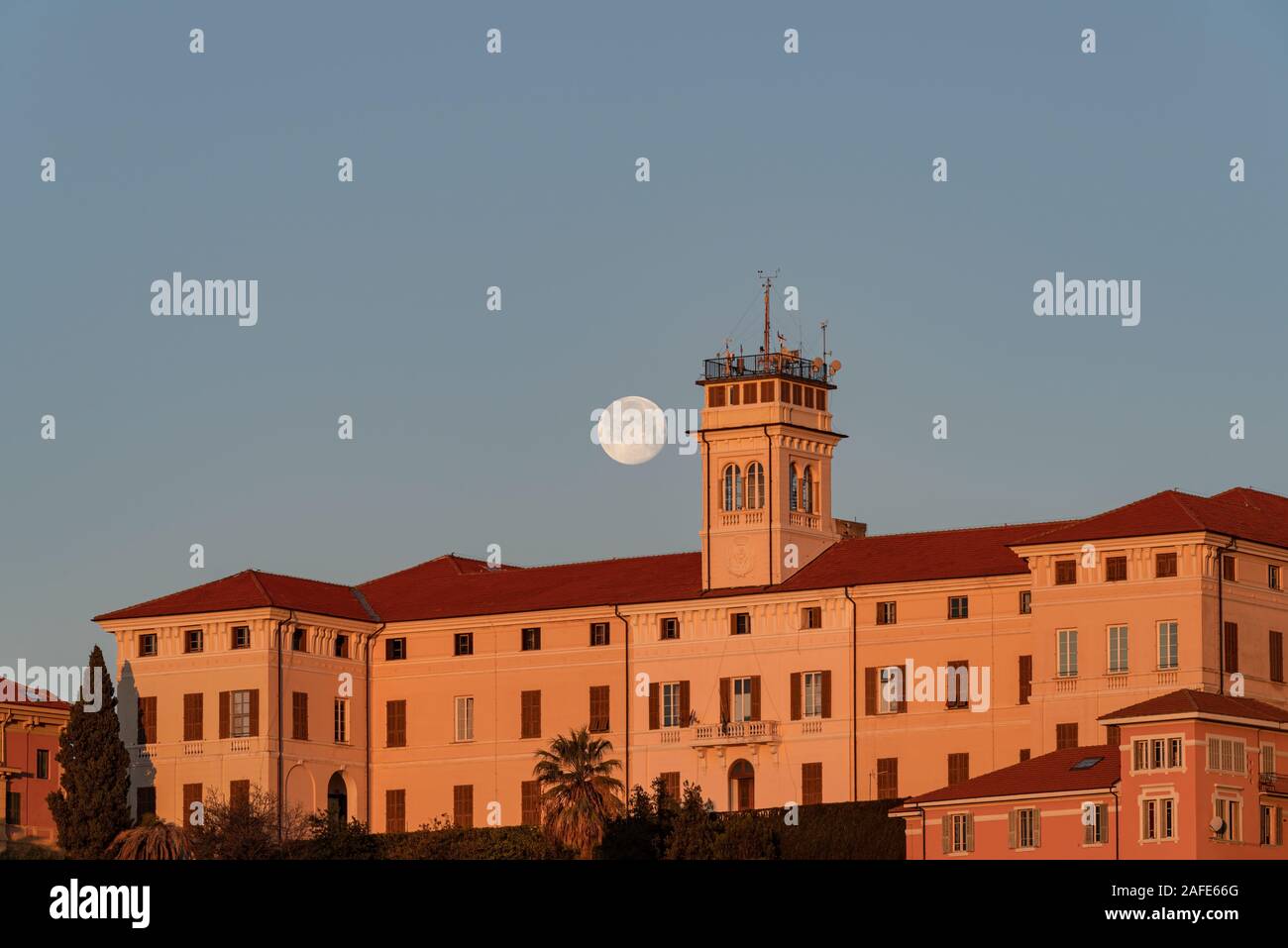 Crescent moon over bright orange hi-res stock photography and images ...