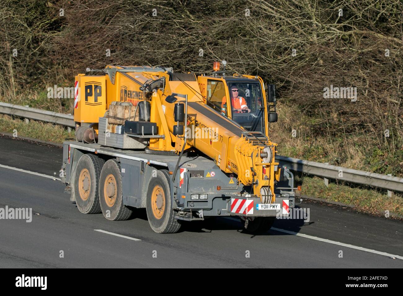 PP engineering telehandler driving on the M61 motorway near Manchester ...
