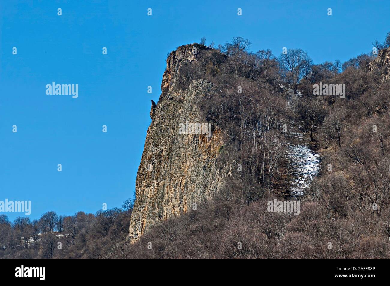 Autumn walk through the maze of snowy Teteven Balkan with high peaks ...