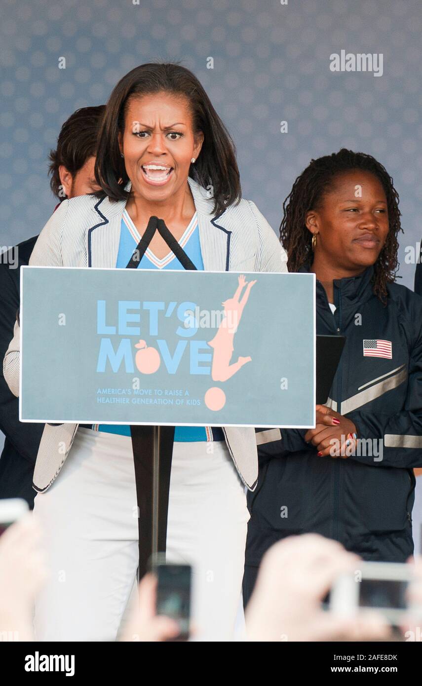 Wearing a patriotic outfit America's first Lady Michelle Obama ...