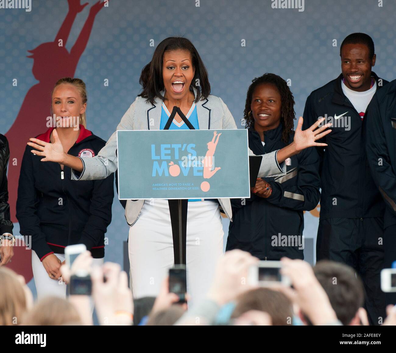 Wearing a patriotic outfit America's first Lady Michelle Obama ...