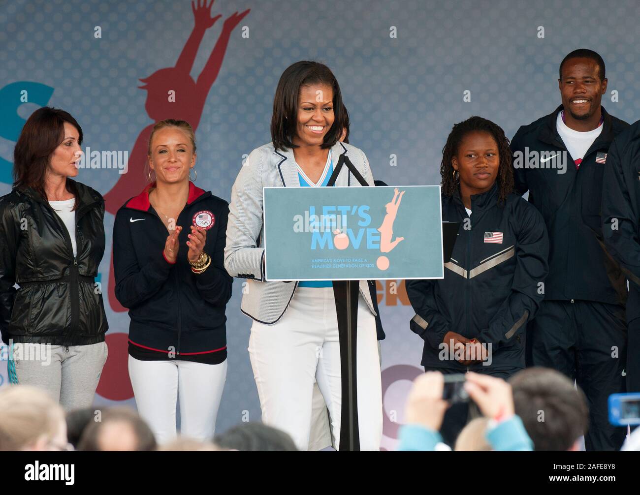 Wearing a patriotic outfit America's first Lady Michelle Obama ...