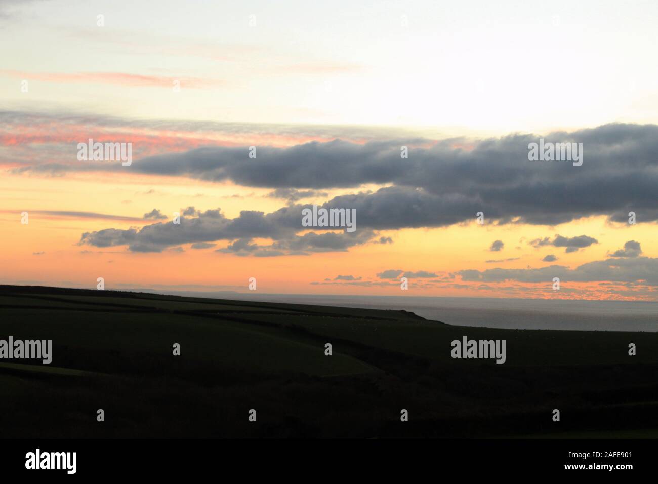 Colourful Orange Clifftop Sunset Stock Photo - Alamy