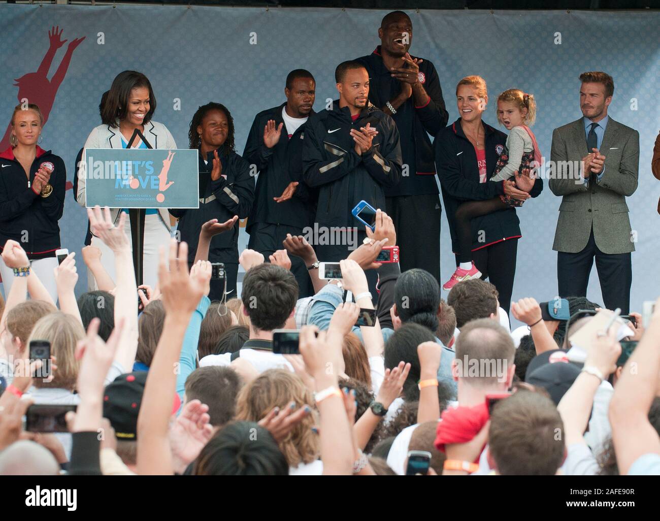 Wearing a patriotic outfit America's first Lady Michelle Obama ...