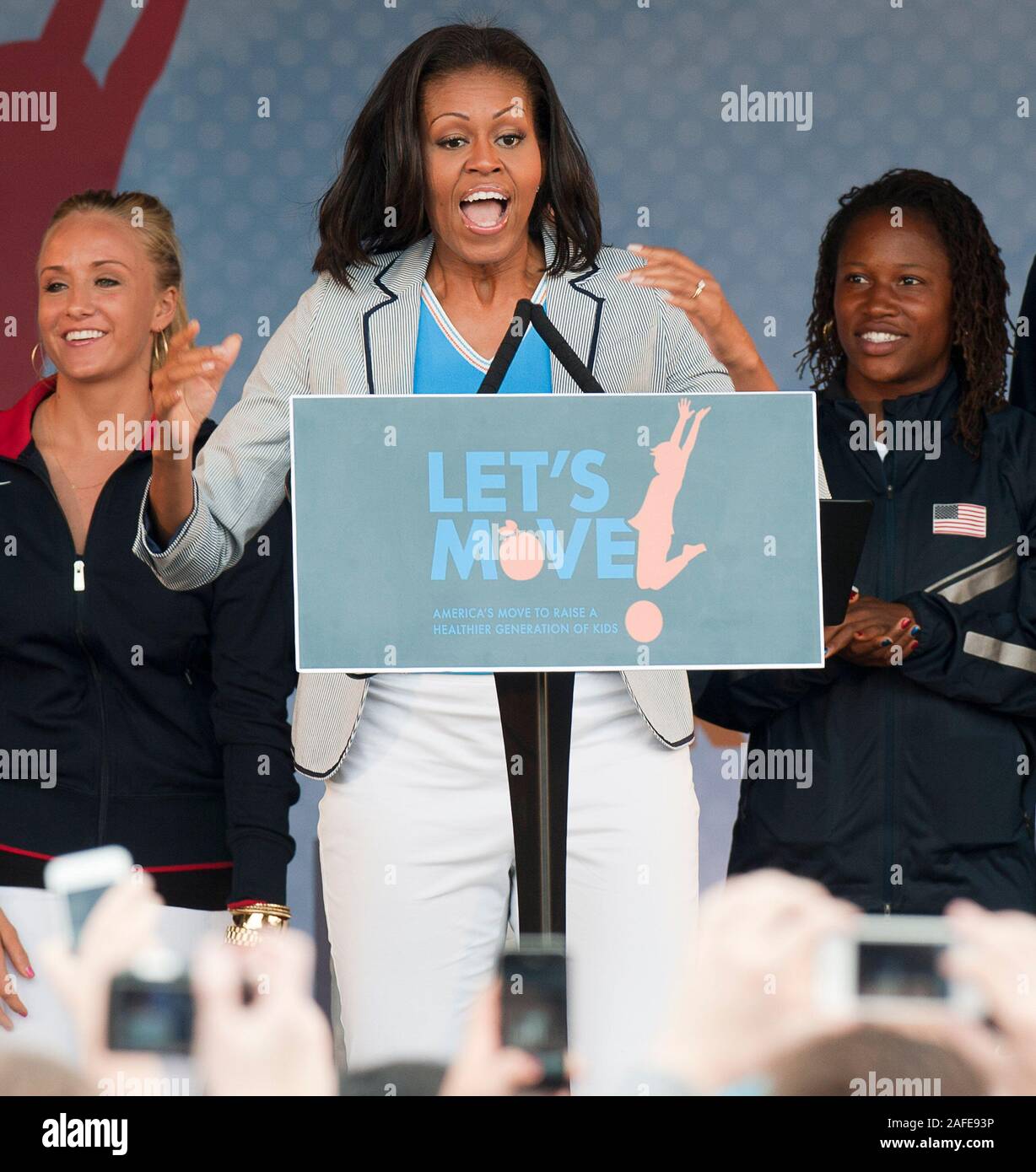 Wearing a patriotic outfit America's first Lady Michelle Obama ...