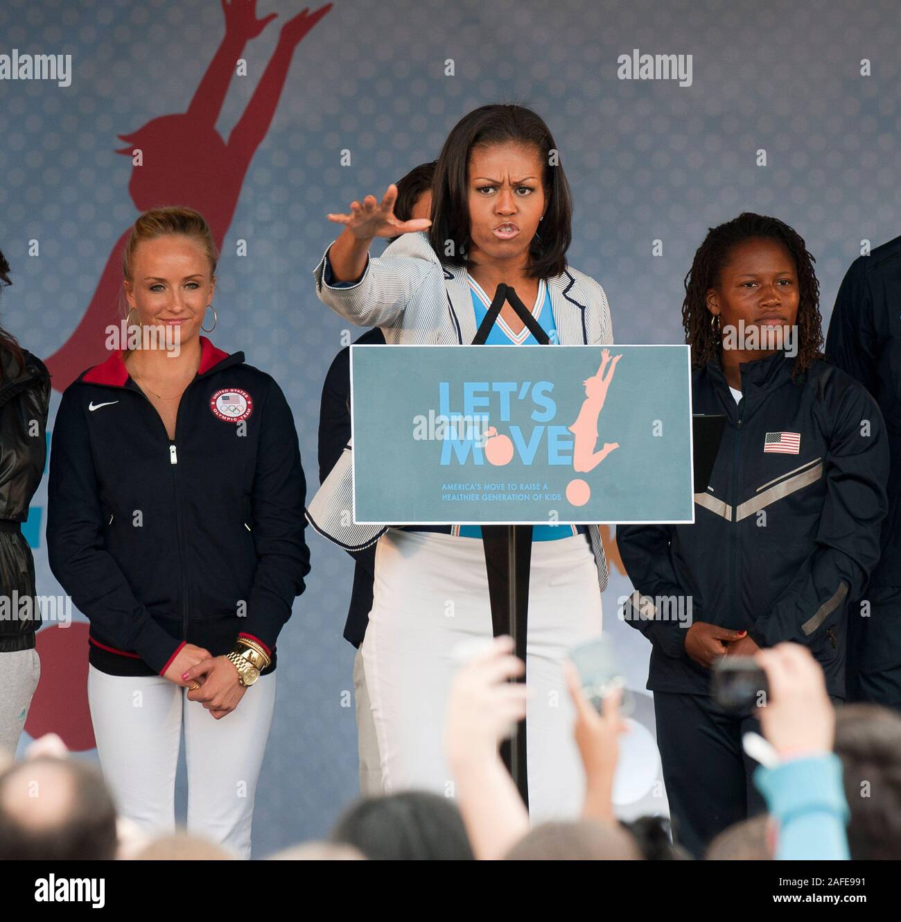 Wearing a patriotic outfit America's first Lady Michelle Obama ...