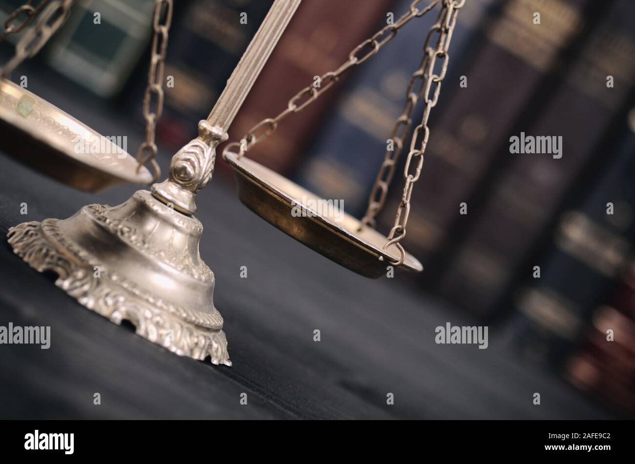 Law and Justice, Legality concept, Scales of Justice on a black wooden ...