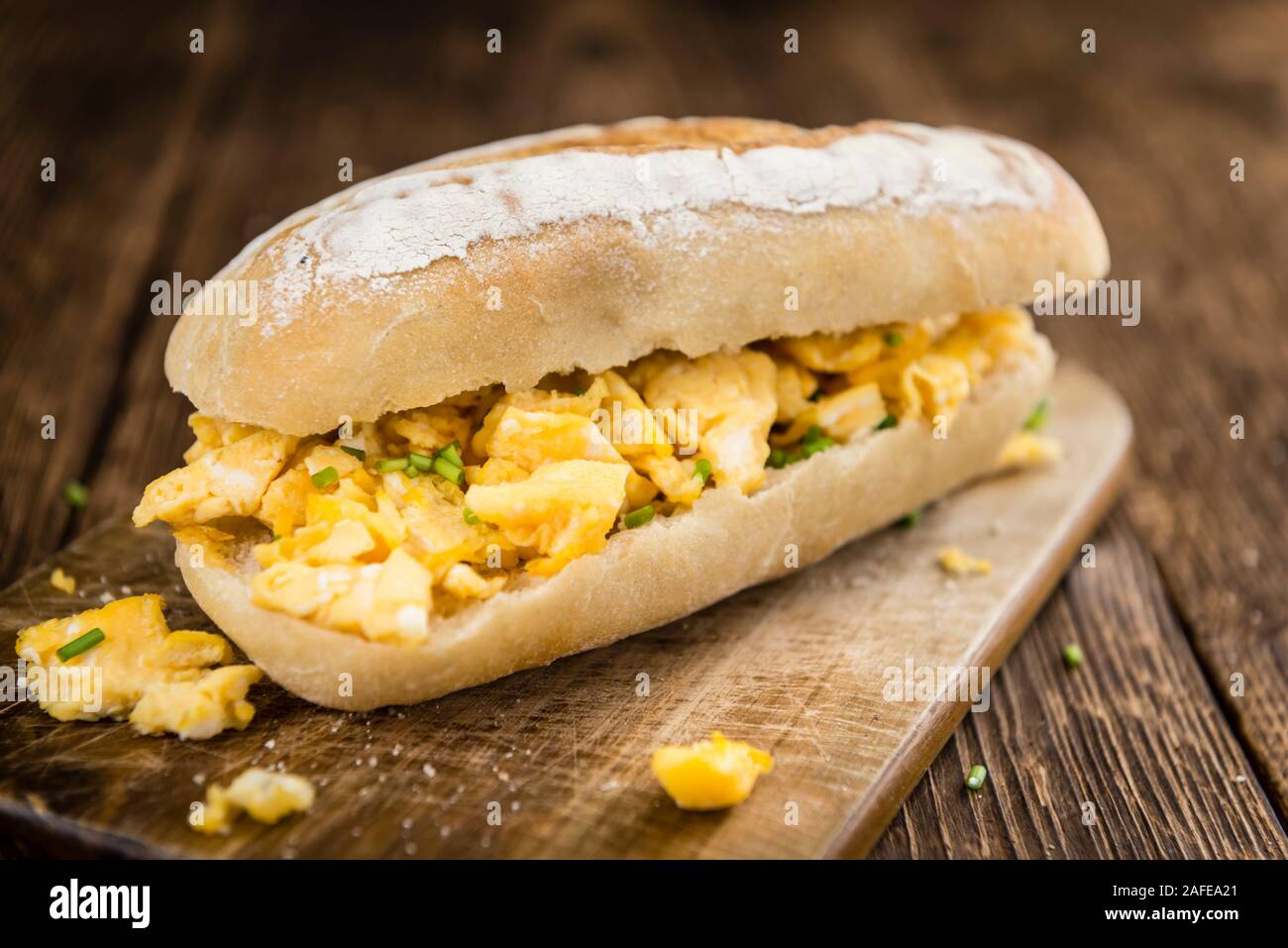 Scrambled eggs bun on plate hi-res stock photography and images - Alamy