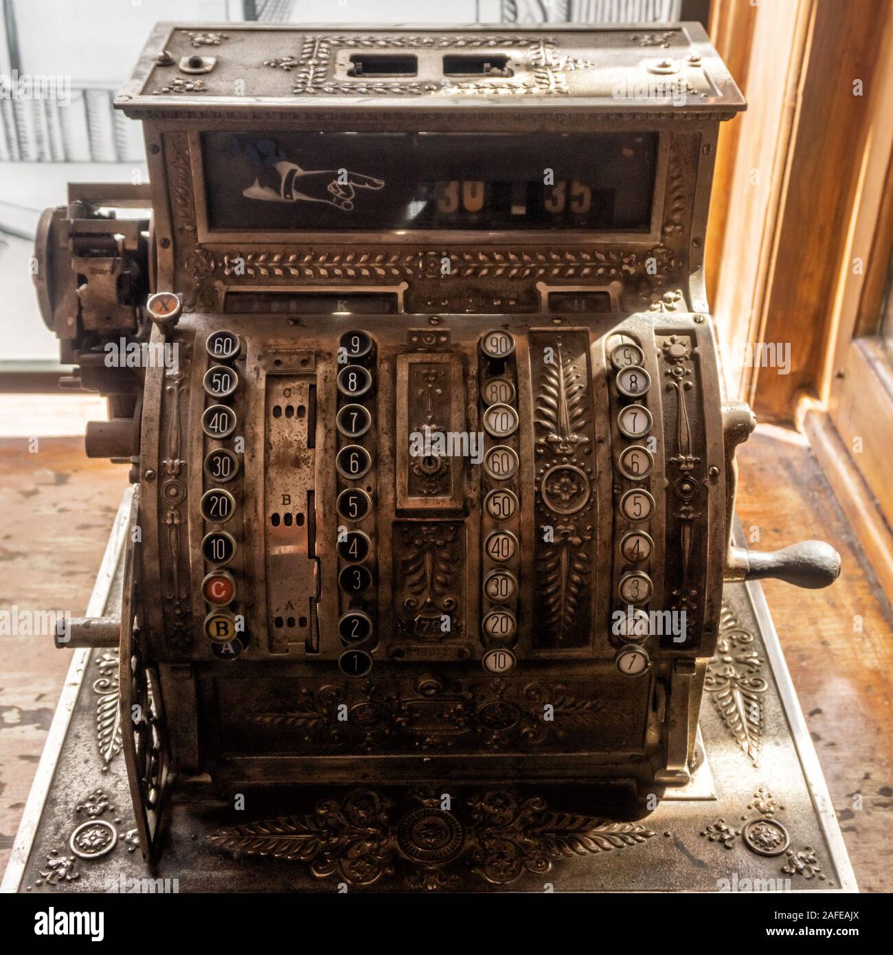 Vintage mechanical cash register in a museum Stock Photo - Alamy