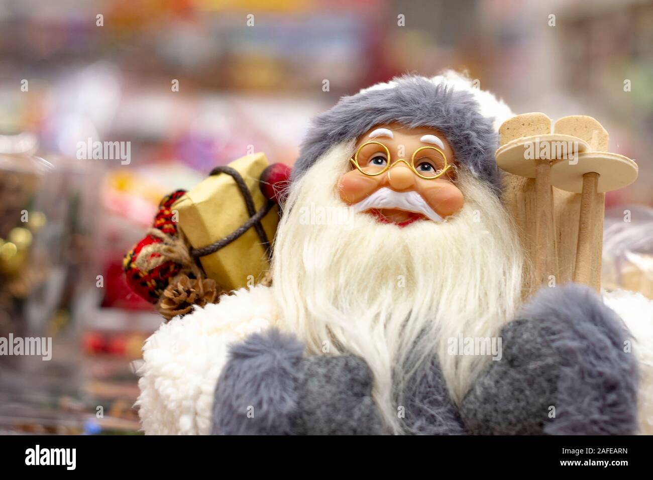 Santa Claus in New Year with bag of gifts behind his back, toy. Front ...