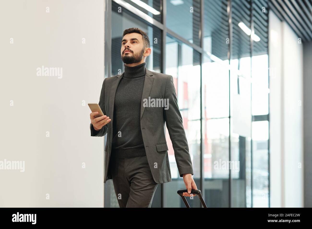 Businessman standing exit hi-res stock photography and images - Alamy