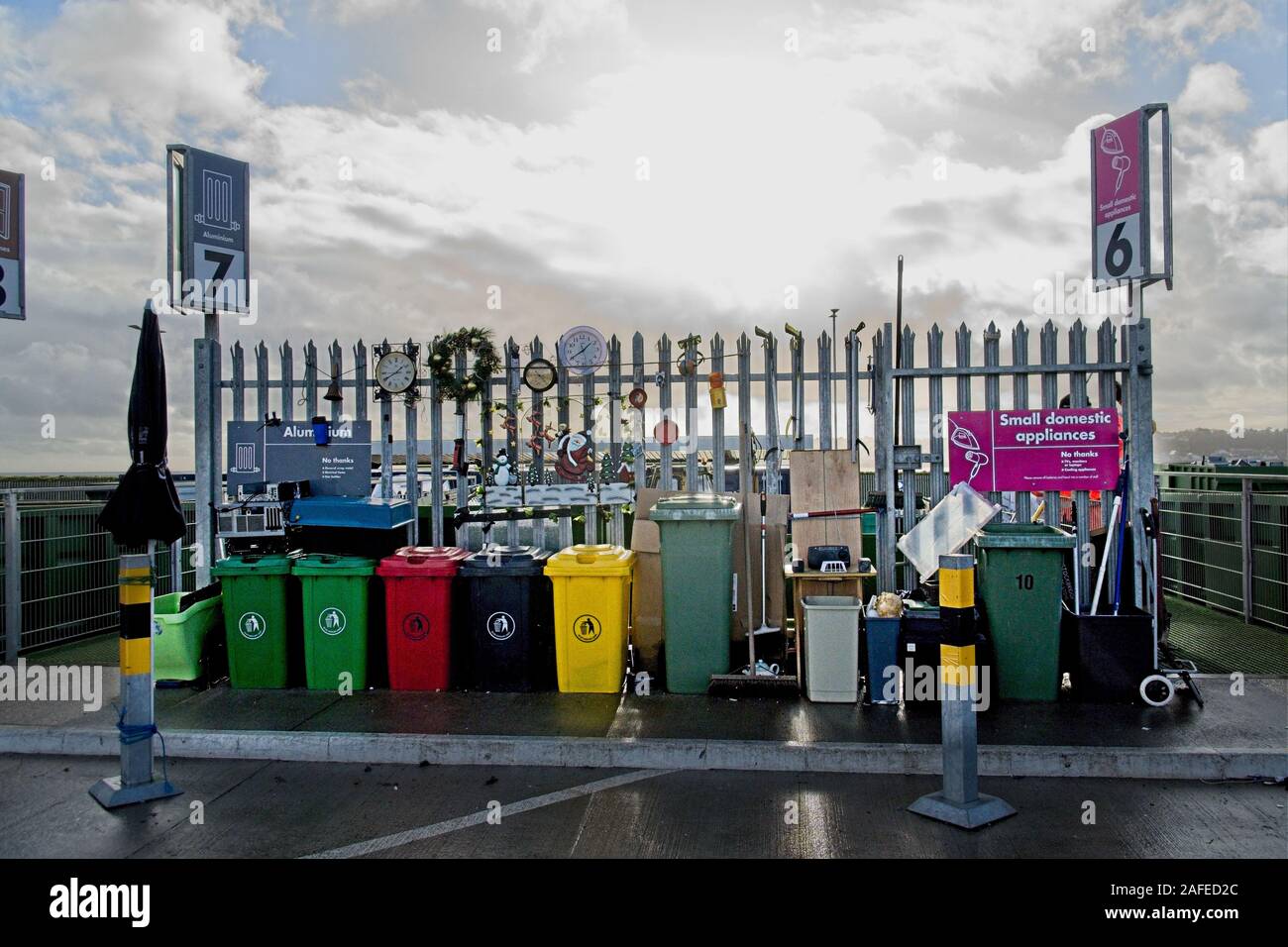 Men at recycling depot posing by their "stall Stock Photo - Alamy