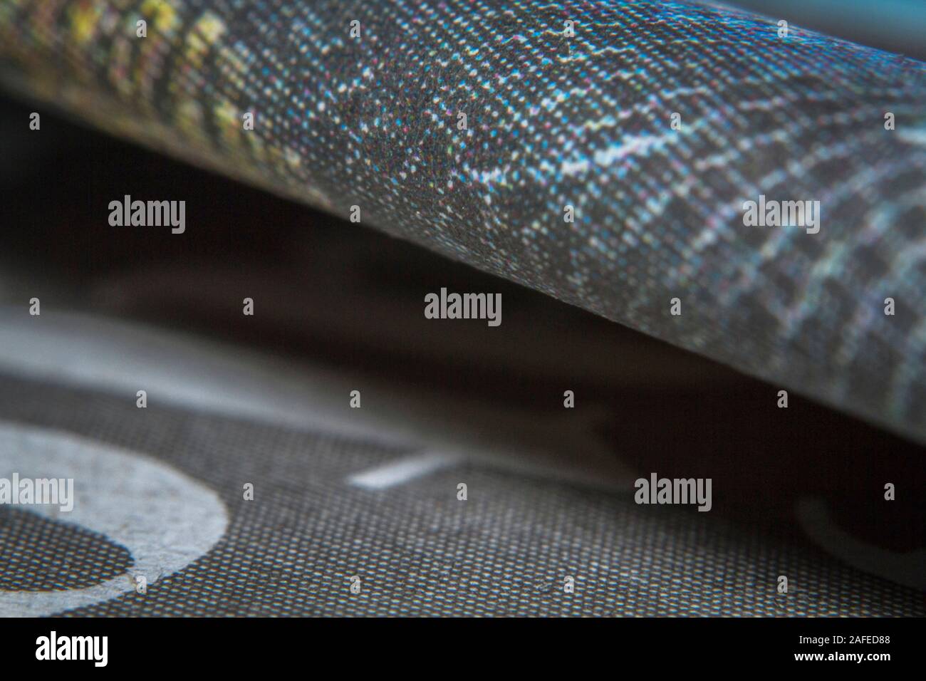 Macro shots folded a newspaper closeup picture Stock Photo - Alamy