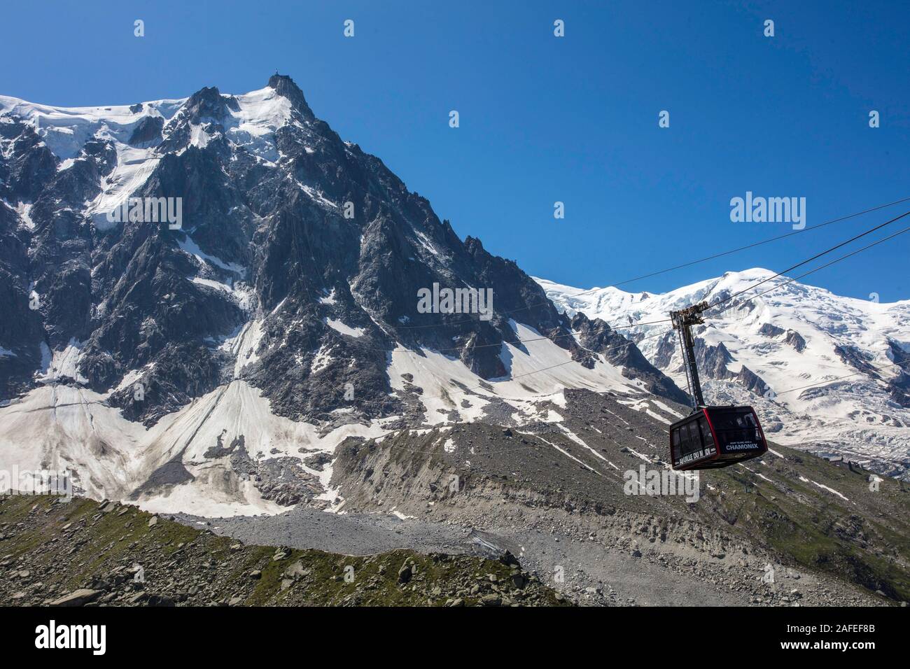A cable car takes people from Chamonix to the Aiguille du Midi, an observatory where to have a ...