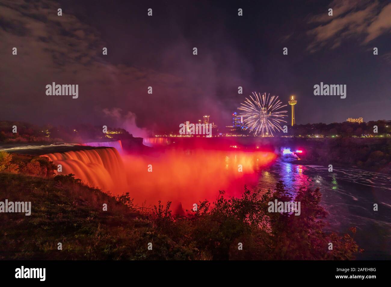 Niagara Falls - fireworks and a colorful illuminations of the waterfall ...