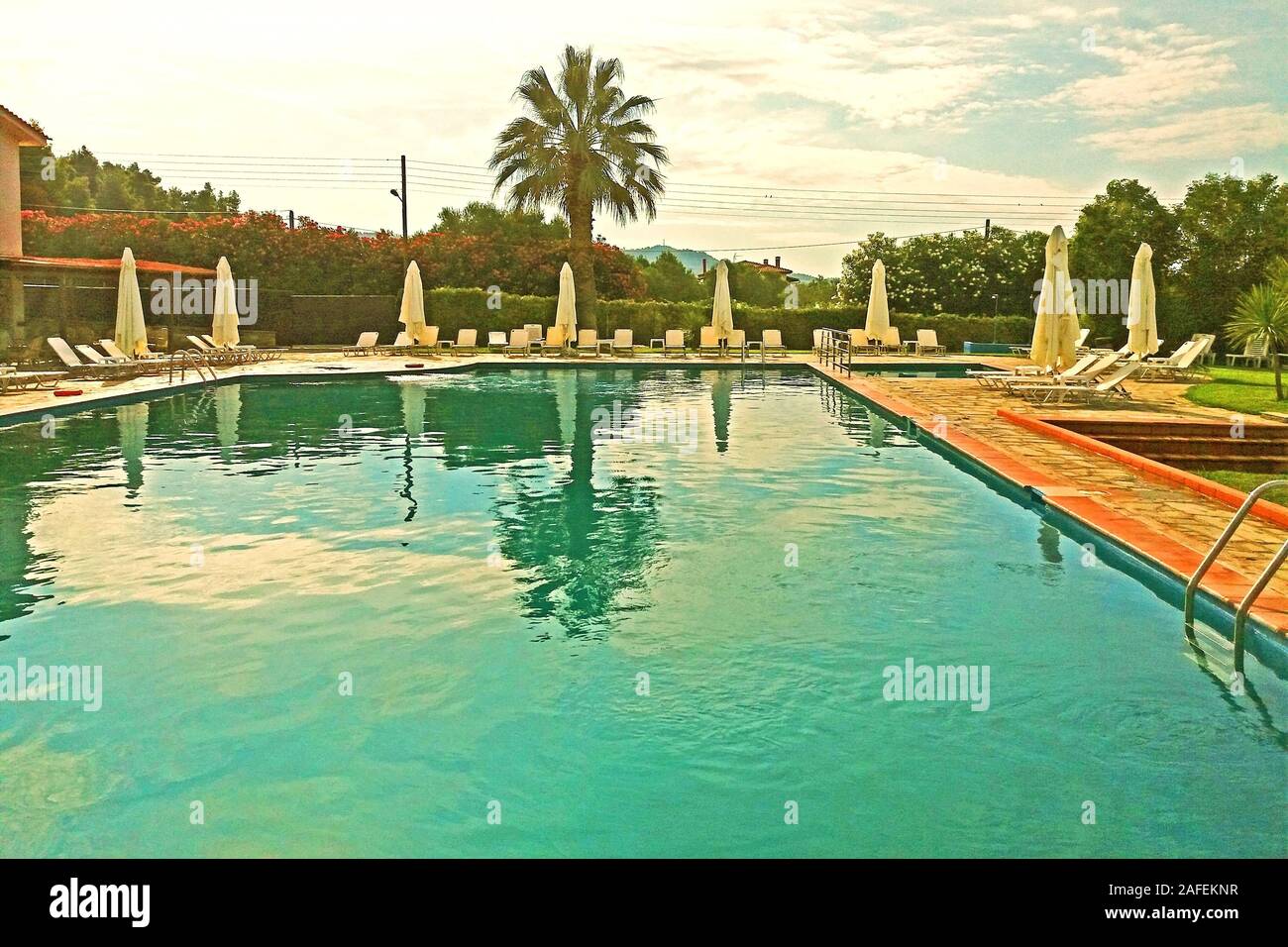 Beautiful swimming pool in greece, landscape, rest area Stock Photo - Alamy