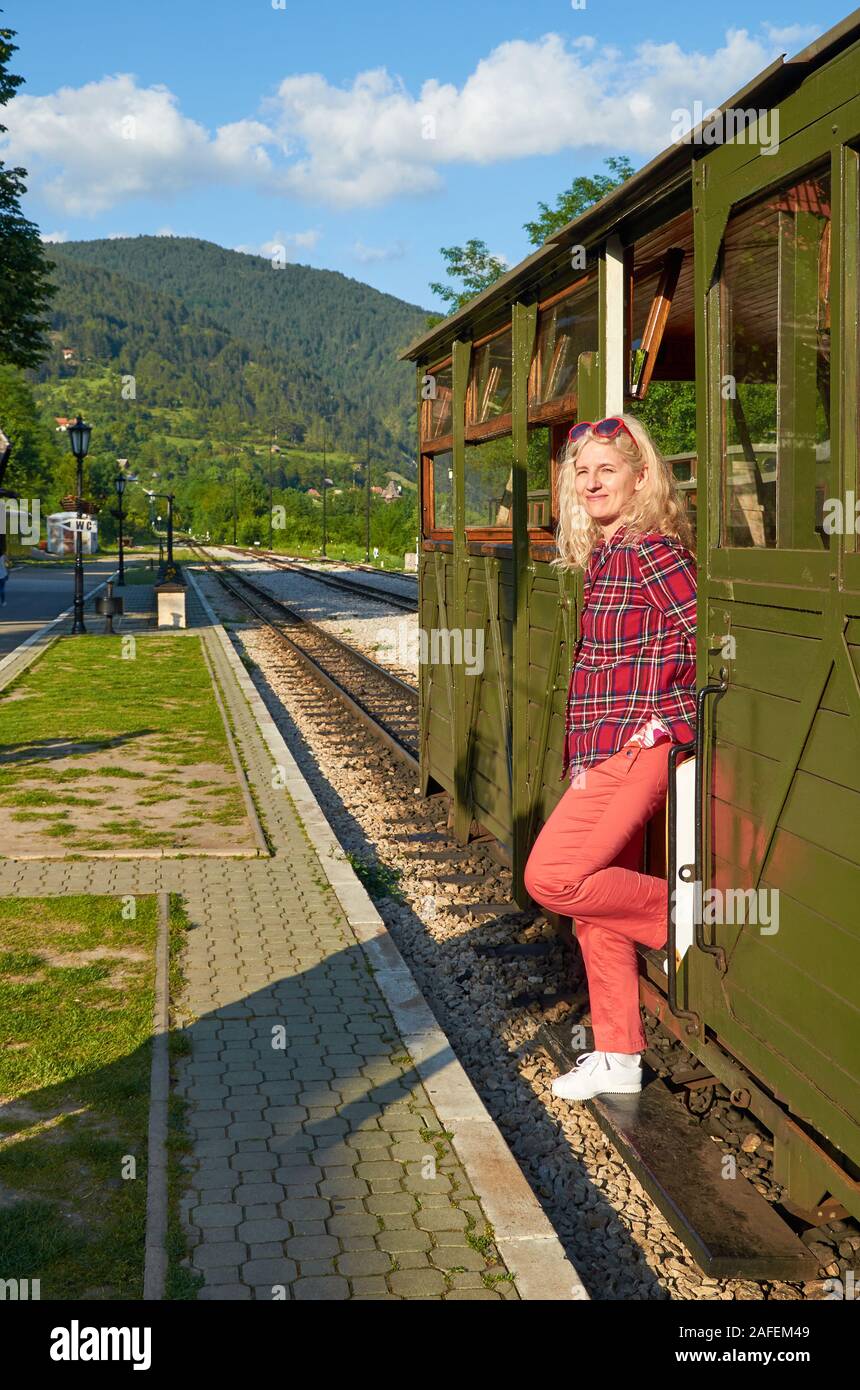Woman getting off train railway hi-res stock photography and images - Alamy
