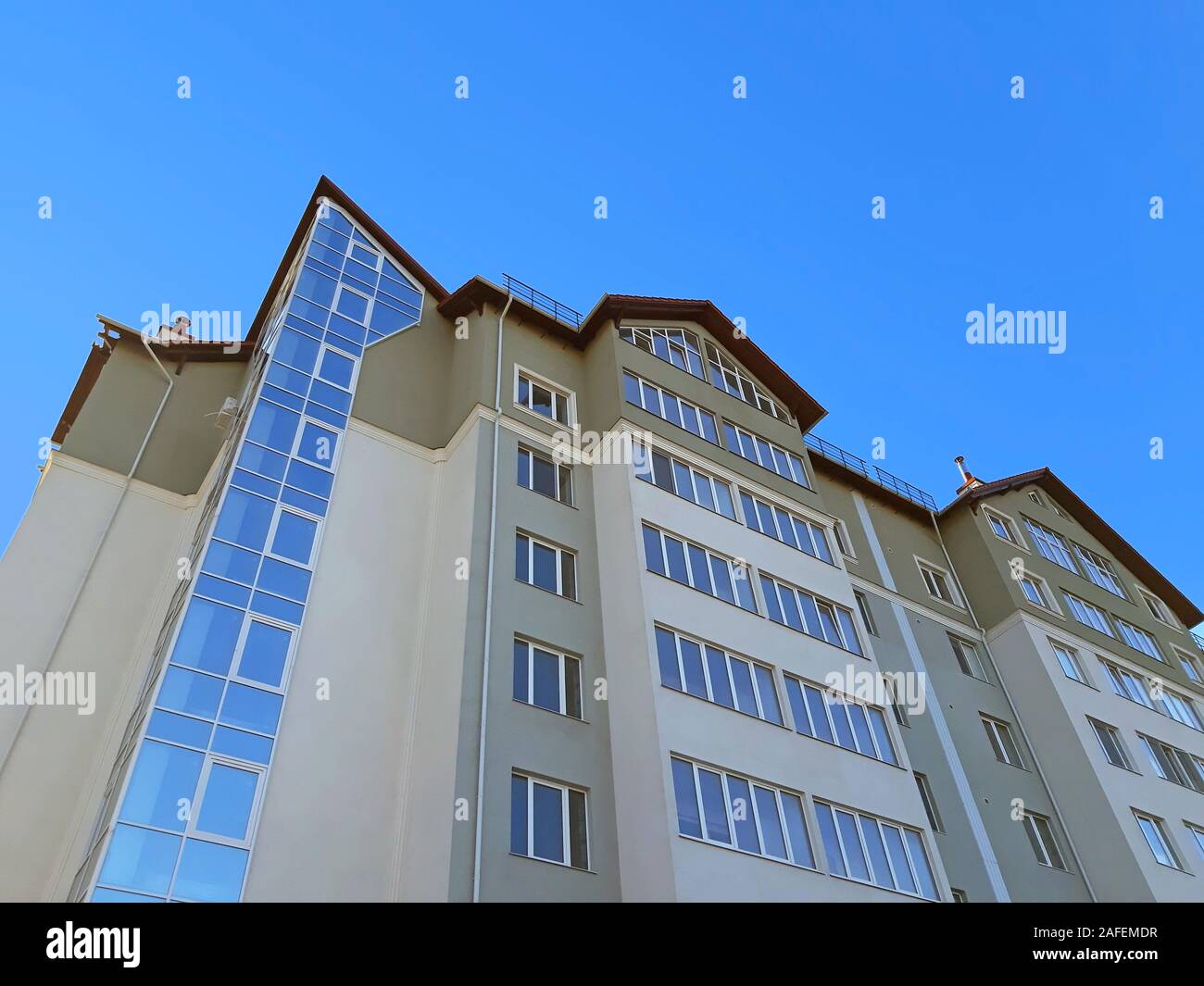 A modern building on blue and clear sky Stock Photo - Alamy