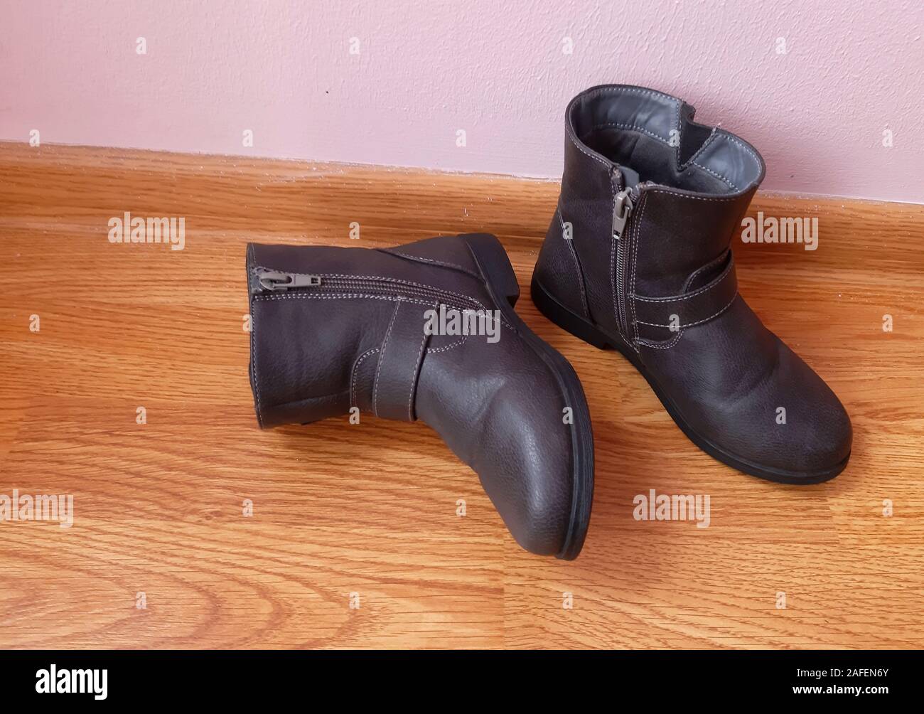 Kid wear very small shoes hi-res stock photography and images - Alamy