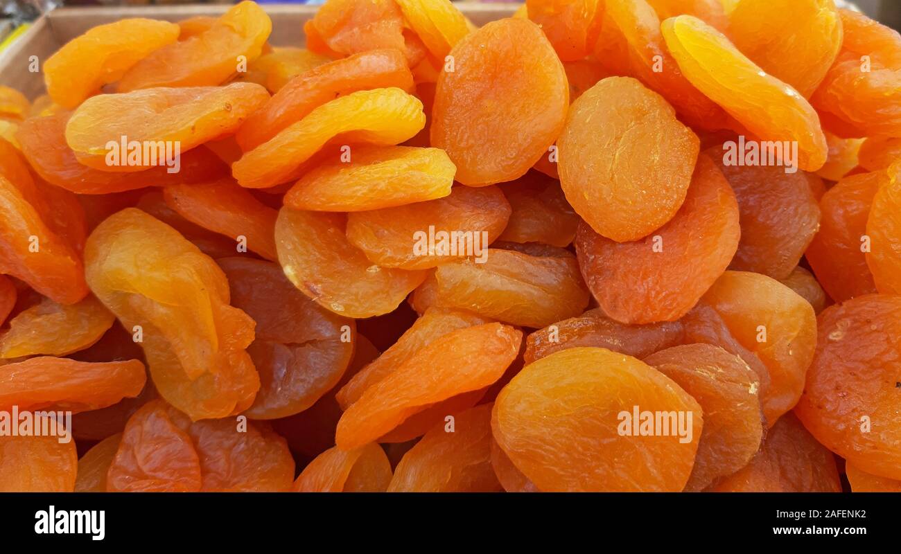 Dried apricots natural food concept, textured close up Stock Photo - Alamy