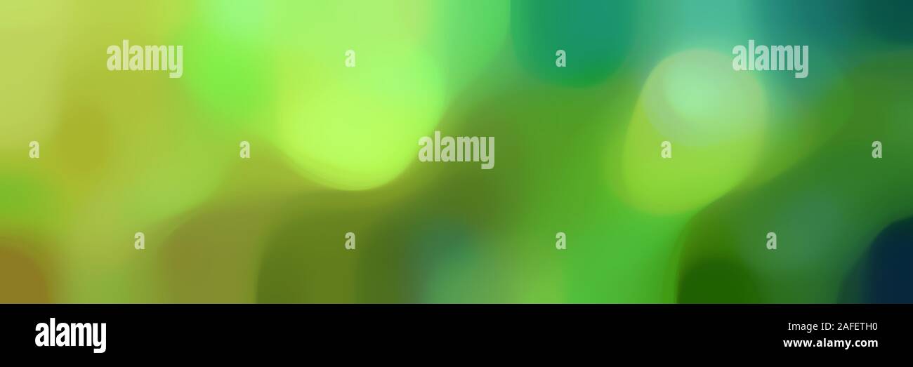 blurred bokeh horizontal background graphic with moderate green, yellow ...