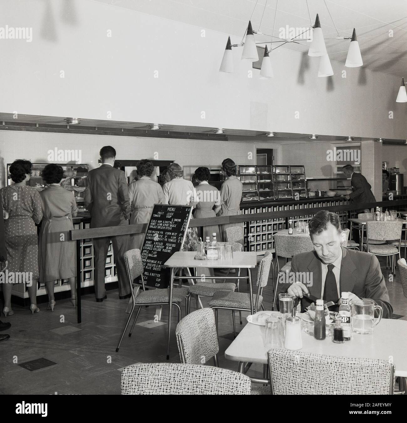 Mealtime 1960s hi-res stock photography and images - Alamy