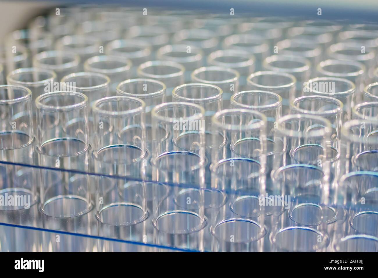 Medical empty glass vials in showcase at pharmaceutical exhibition ...