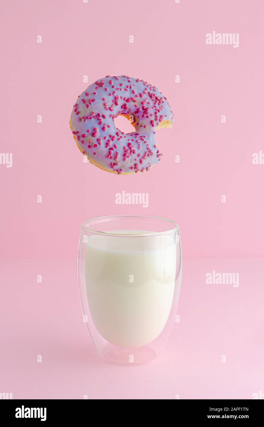 Food levitation concept. Delicious breakfast with glass of milk and ...