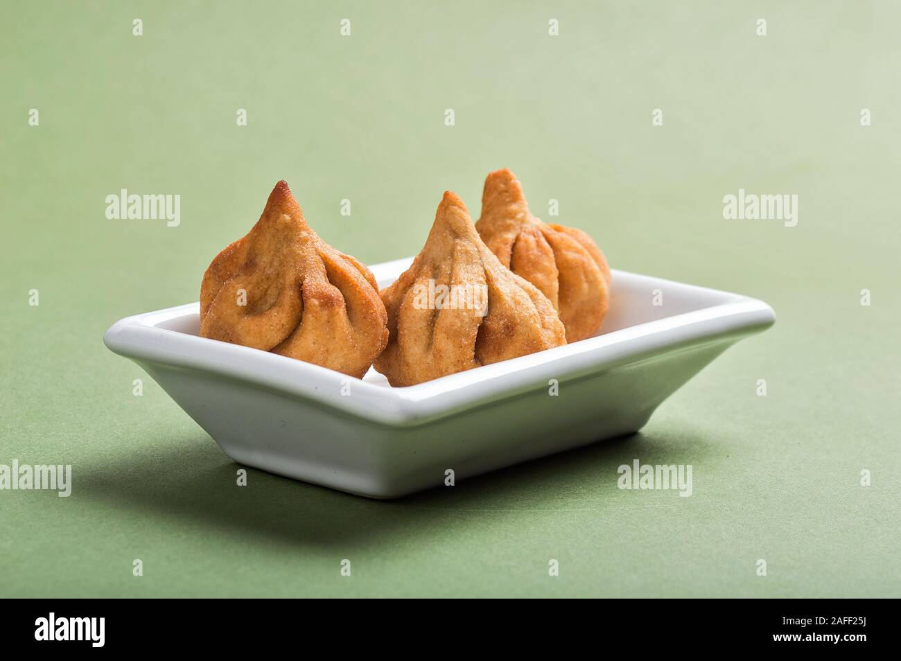 Indian Food: Modak on green background, Maharashtra Sweet Dish ...