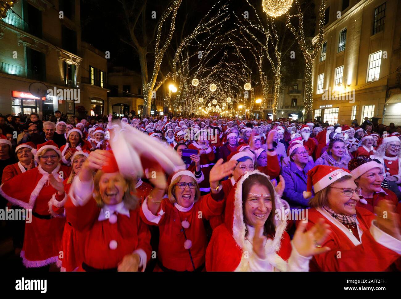 Palma, Spain. 15th Dec, 2019. People dressed as Santa Claus seen ...
